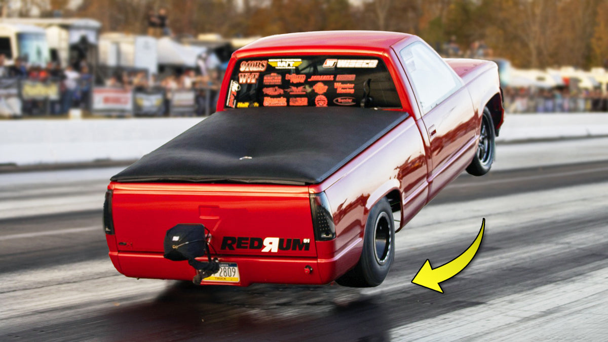 Truck takes FLIGHT! all 4 wheels off the ground with HUGE wheelie ...